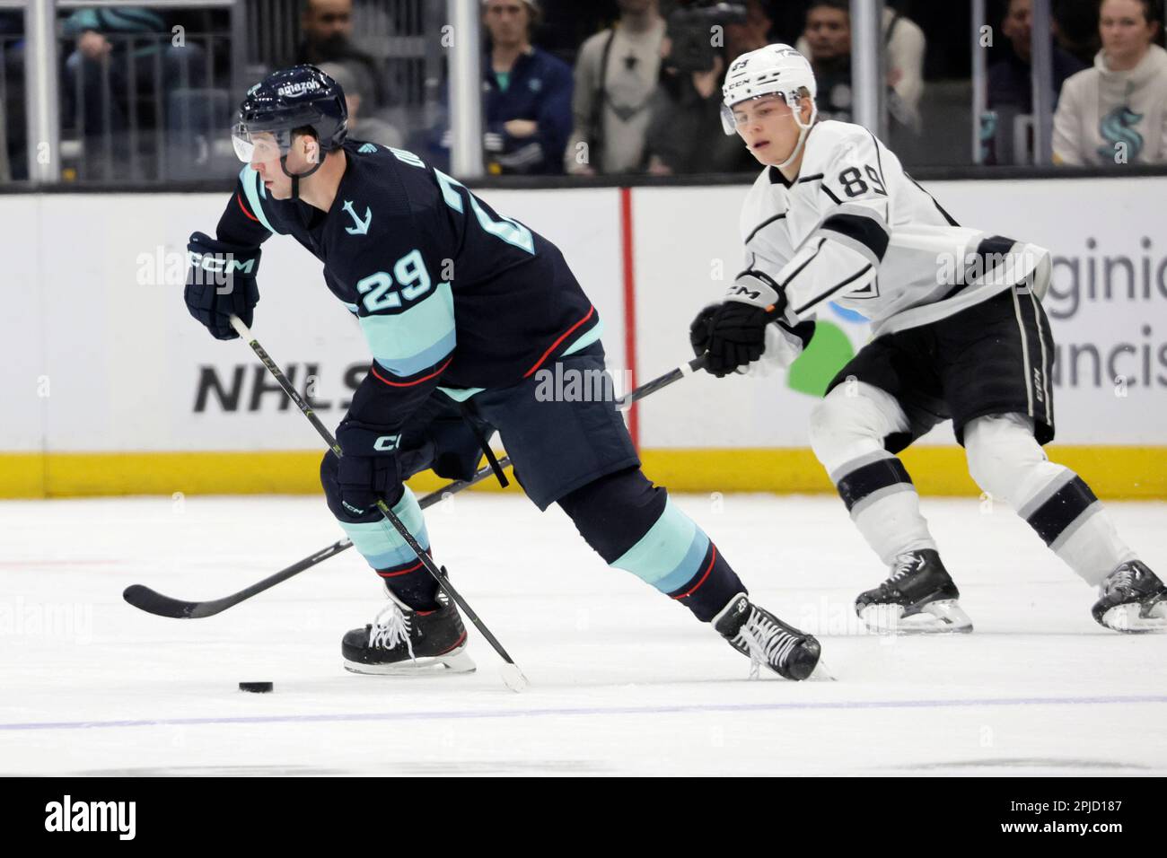 Seattle Kraken defenseman Vince Dunn (29) skates with the puck while ...