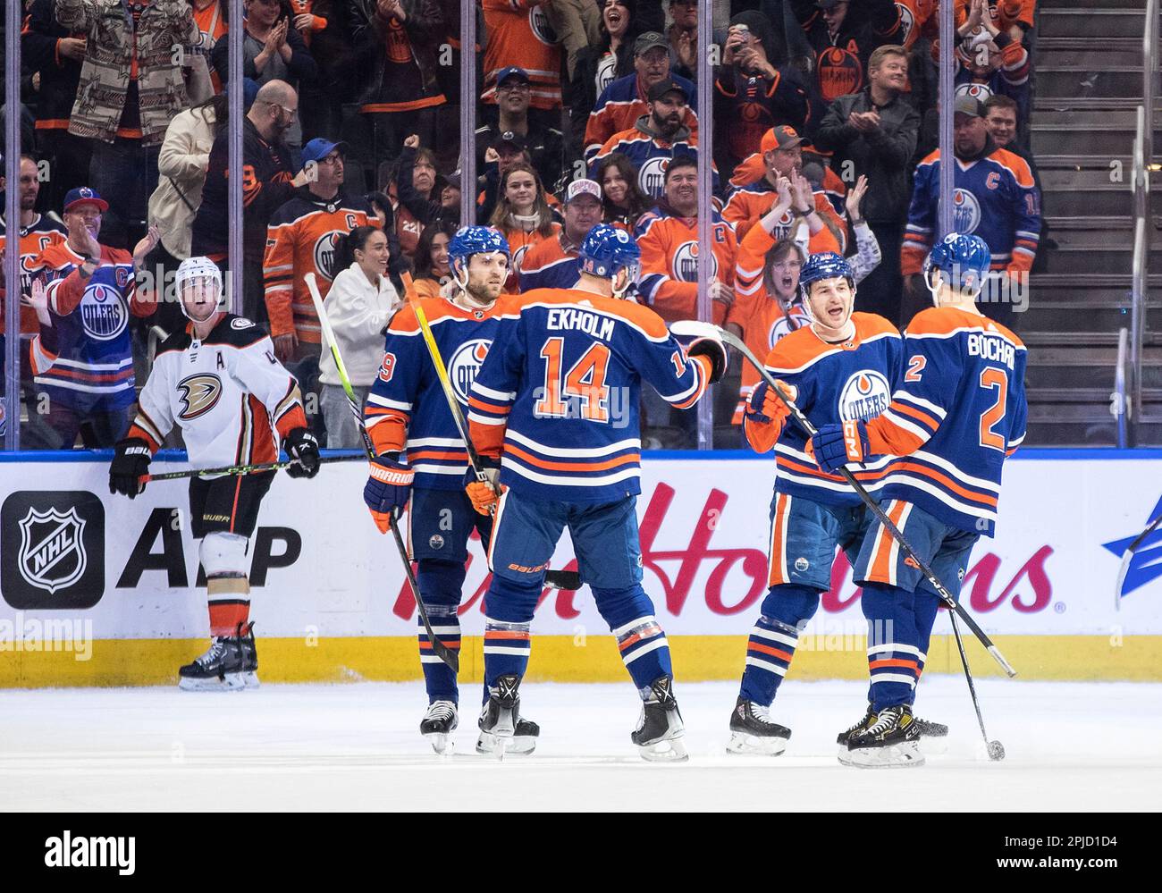 Edmonton Oilers' Leon Draisaitl (29), Mattias Ekholm (14), Zach Hyman ...