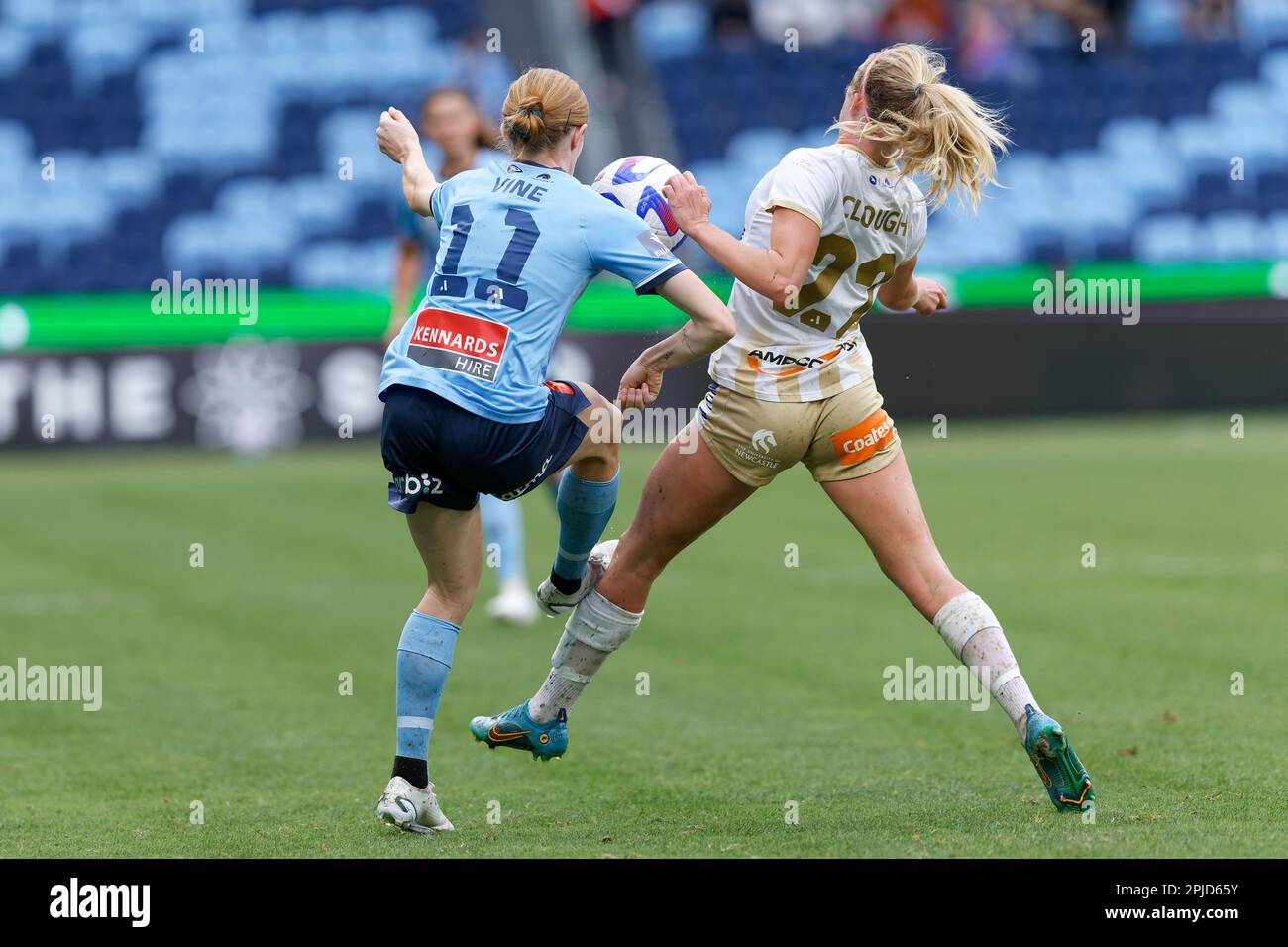 Cortnee Vine of Sydney competes for the ball with Cannon Clough of ...