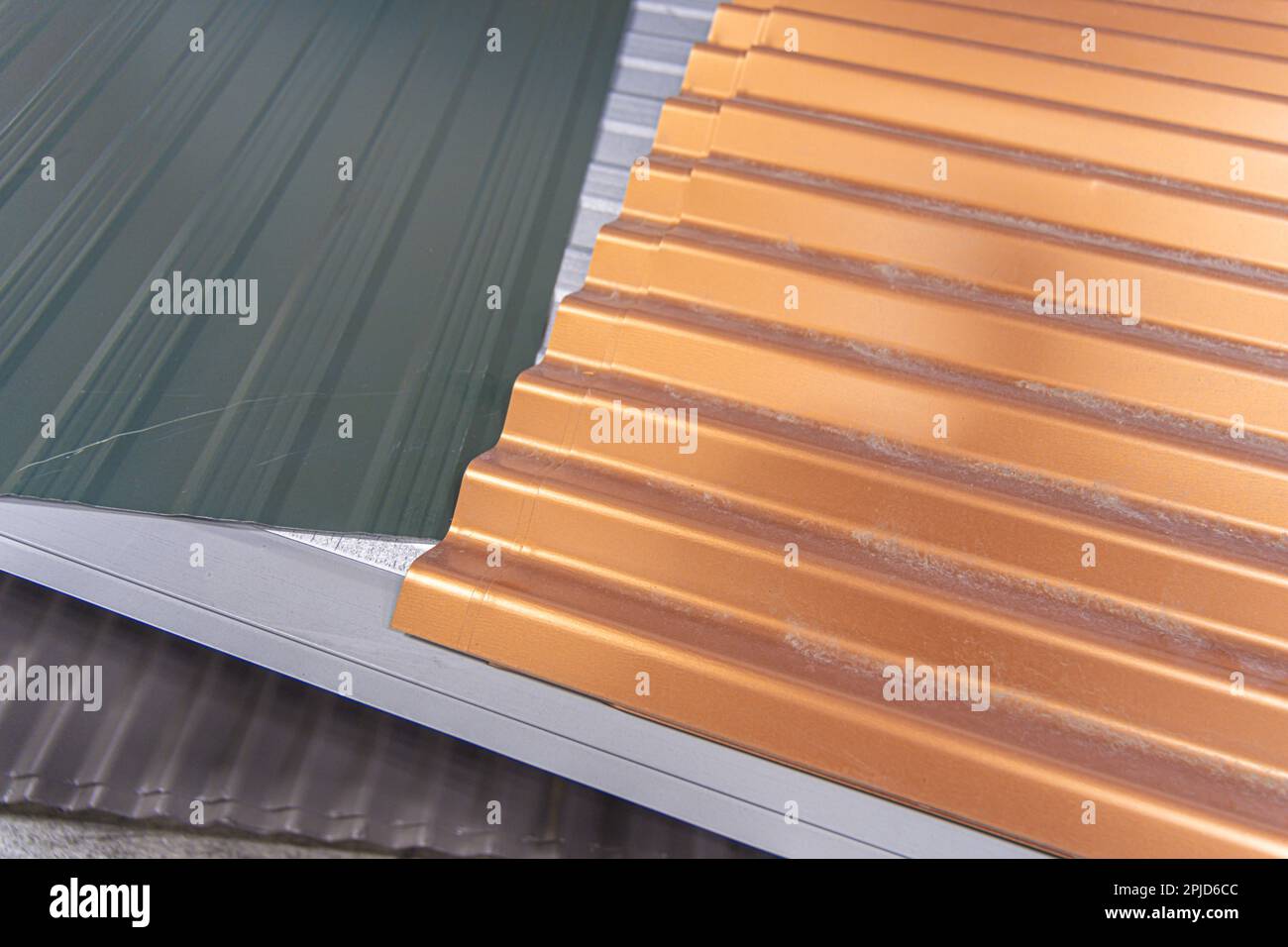 Metal Corrugated roofing profiles in metal roofing factory Stock Photo ...