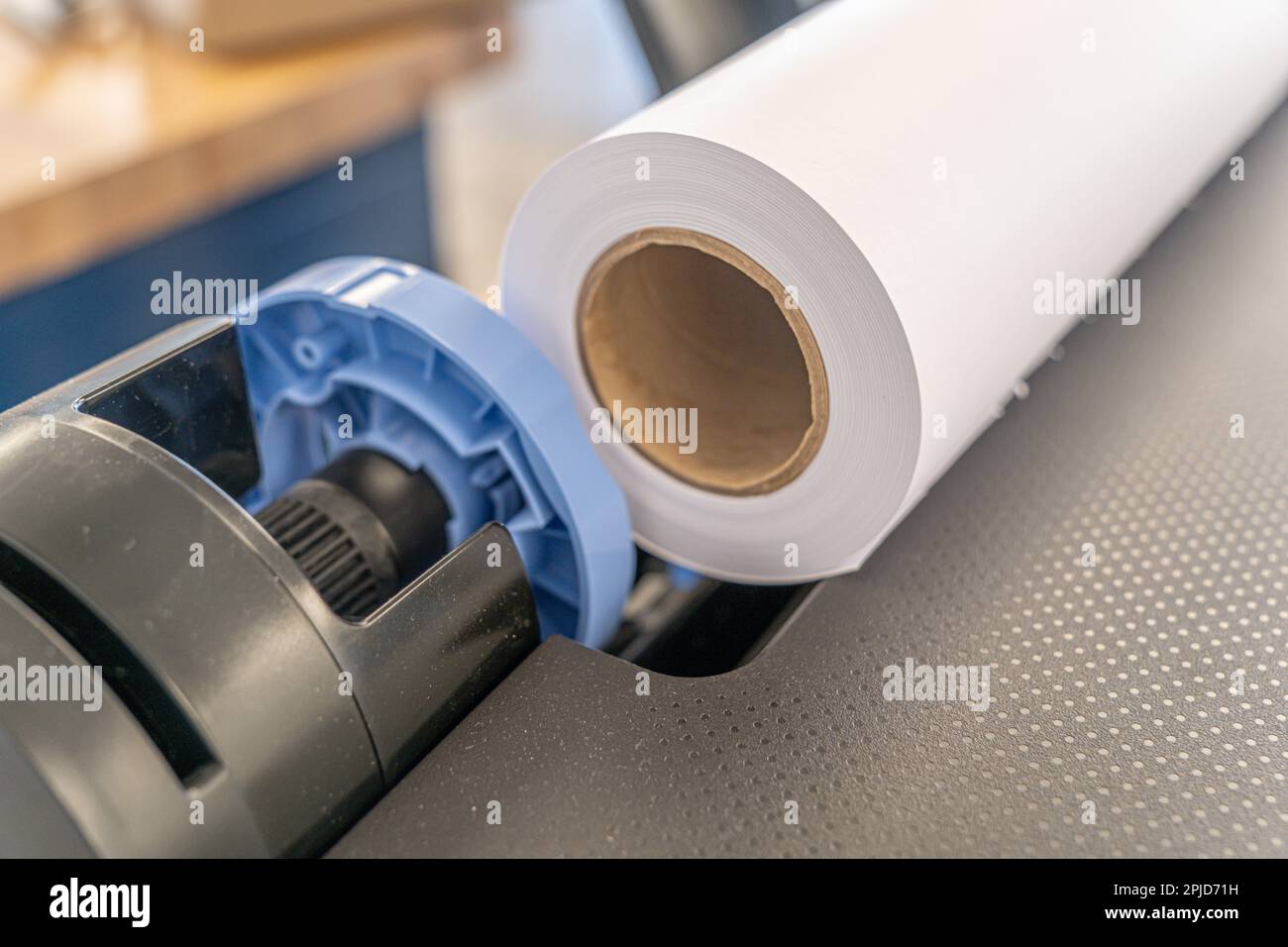 Roll of White printing paper to be loaded on printer Stock Photo - Alamy