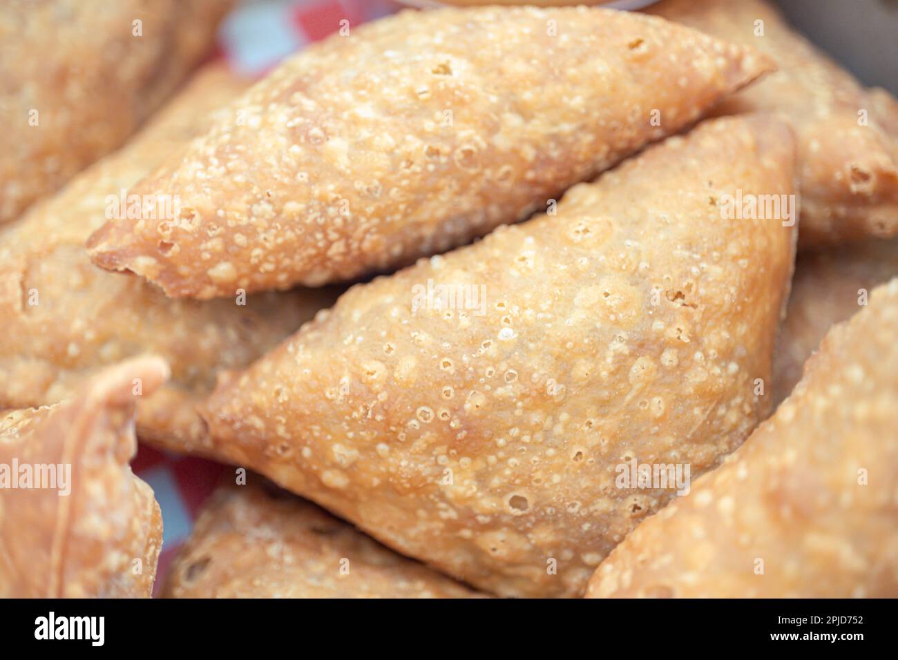 Deep fried Meat and Vegetable Samosa snacks ready to eat Stock Photo ...