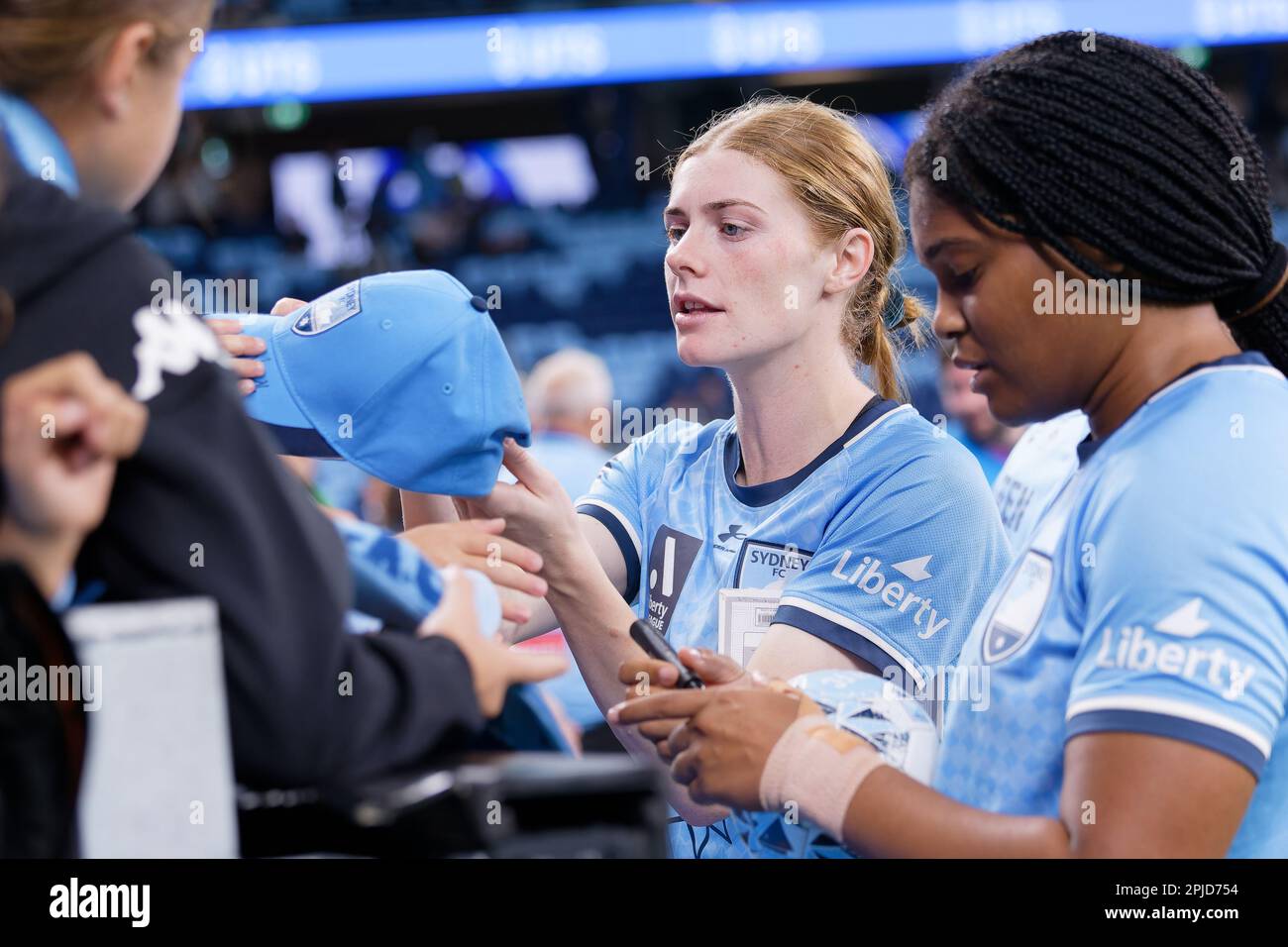 Cortnee Vine and Madison Haley signs autographs after the match between ...
