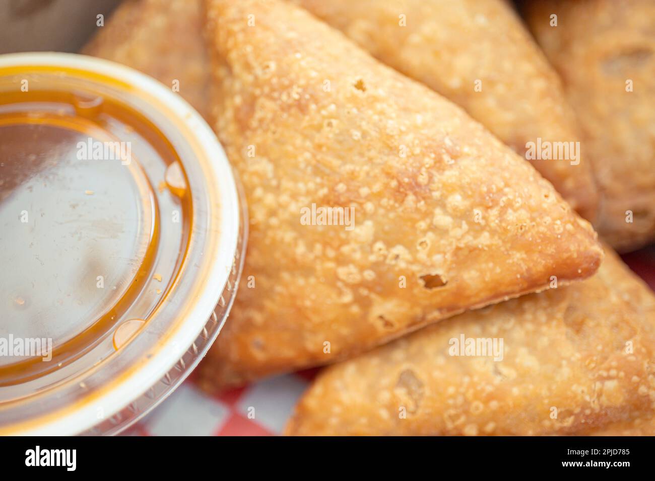 Deep fried Meat and Vegetable Samosa snacks ready to eat Stock Photo ...
