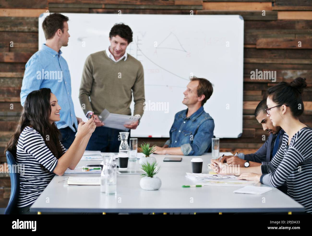 Working together is success. a coworkers in a business meeting Stock ...