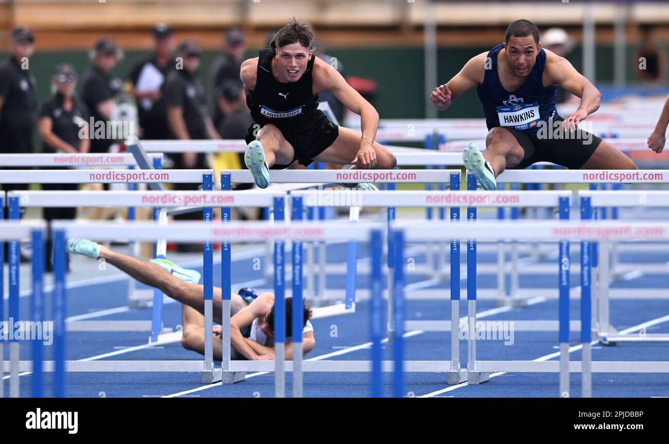 Mitchell Lightfoot (centre) of Australia and Joshua Hawkins of New ...