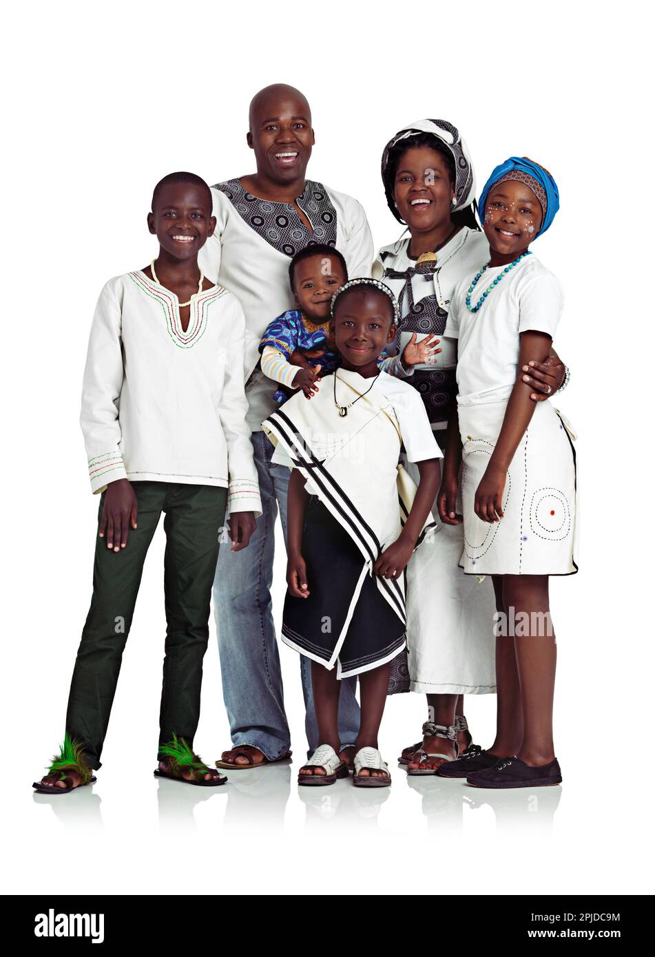Theyre a happy family. Studio shot of a traditional african family ...