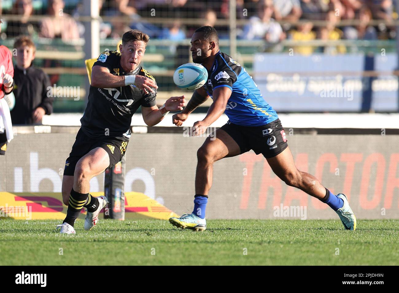 Hurricanes' Brett Cameron (L) with Force’s Zach Kibirige during the ...