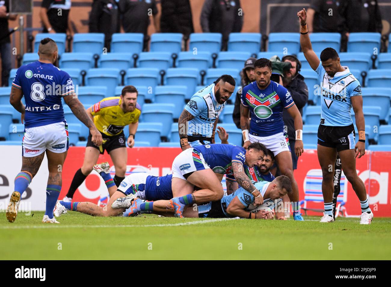 Teig Wilton of the Cronulla Sharks scores during the NRL Round 5 match ...