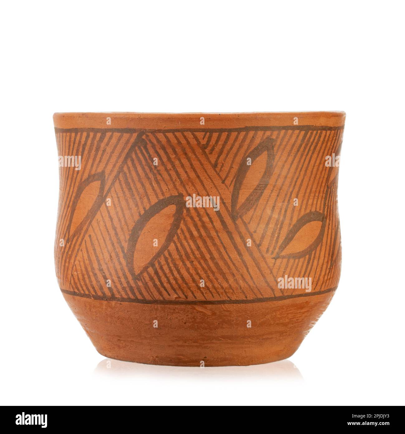 Clay cup with ornament, without handle. Country style. Close-up ...