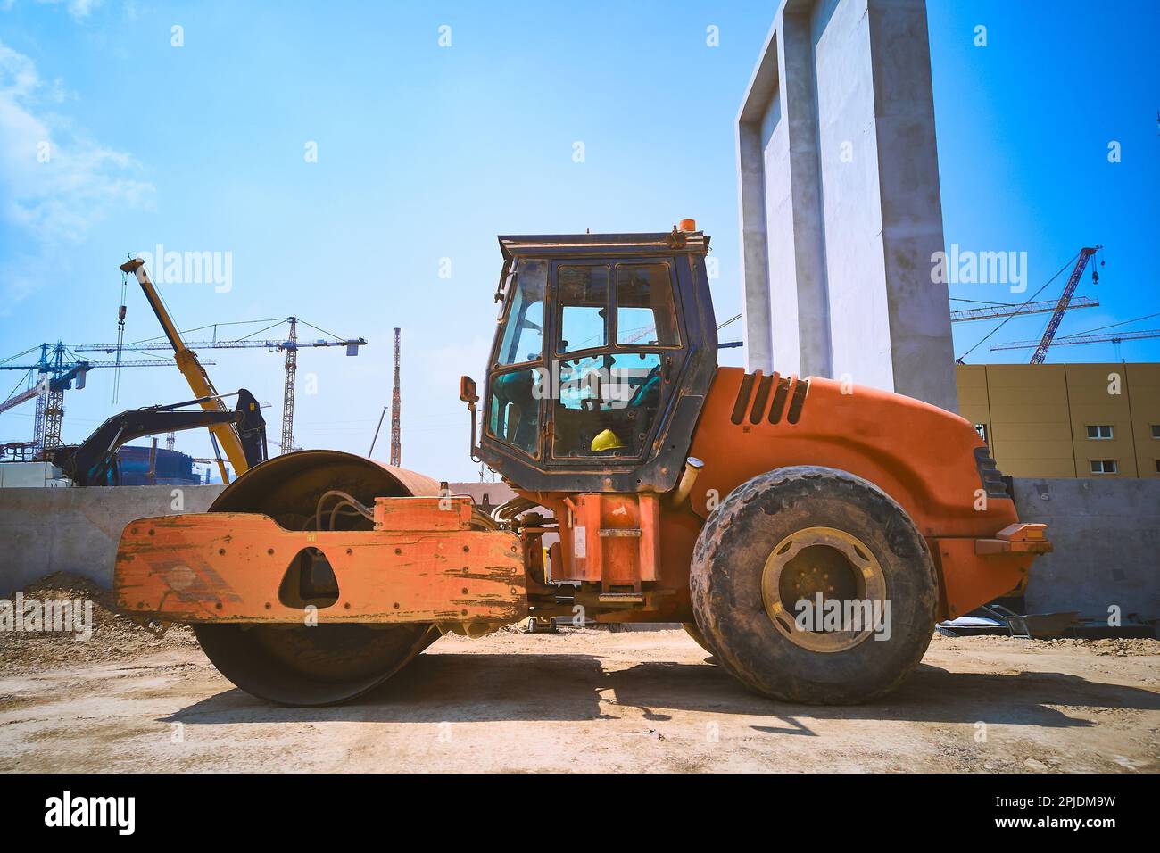 Soil compactor. Road roller at construction site Stock Photo - Alamy