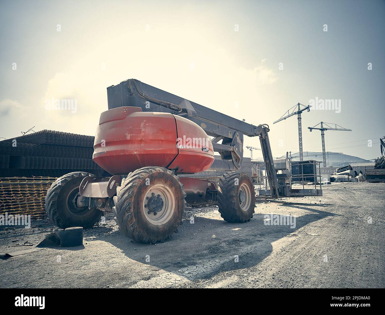 Articulated telescopic elevator. Boom lift picker at construction site ...