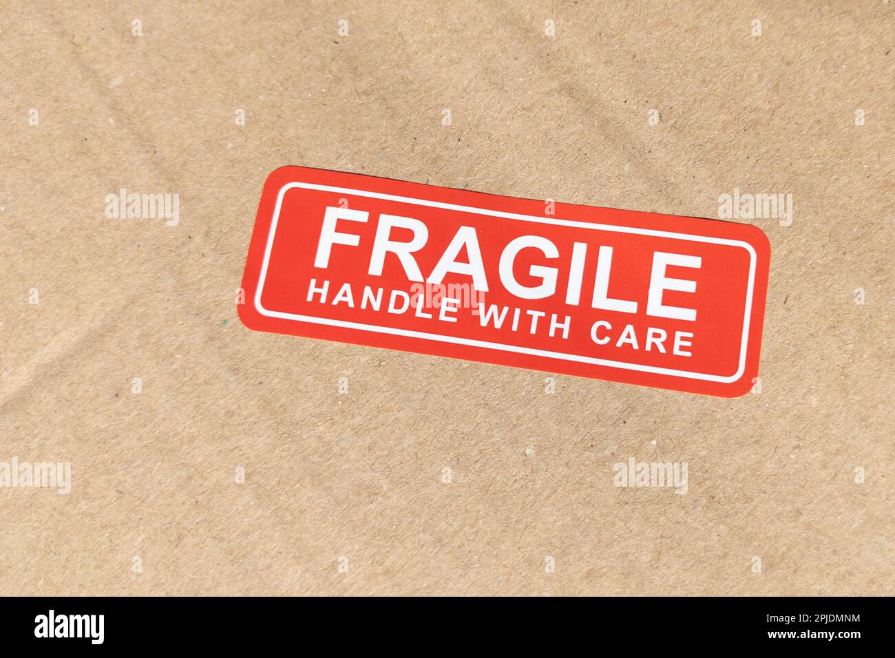 Handle with care sticker hi-res stock photography and images - Alamy