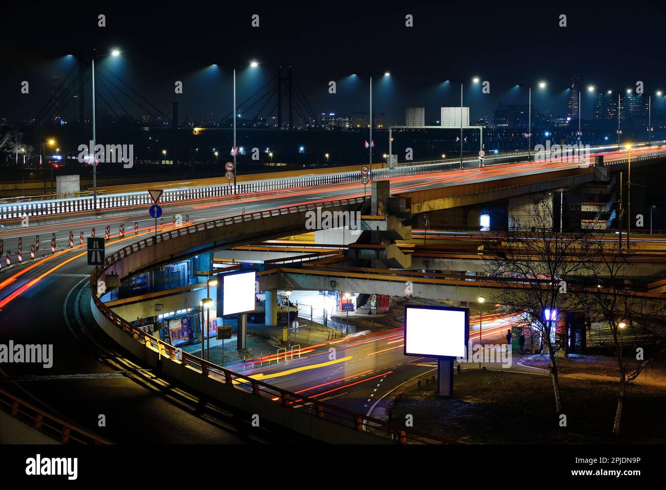 Multilevel transport interchange in night time Stock Photo - Alamy