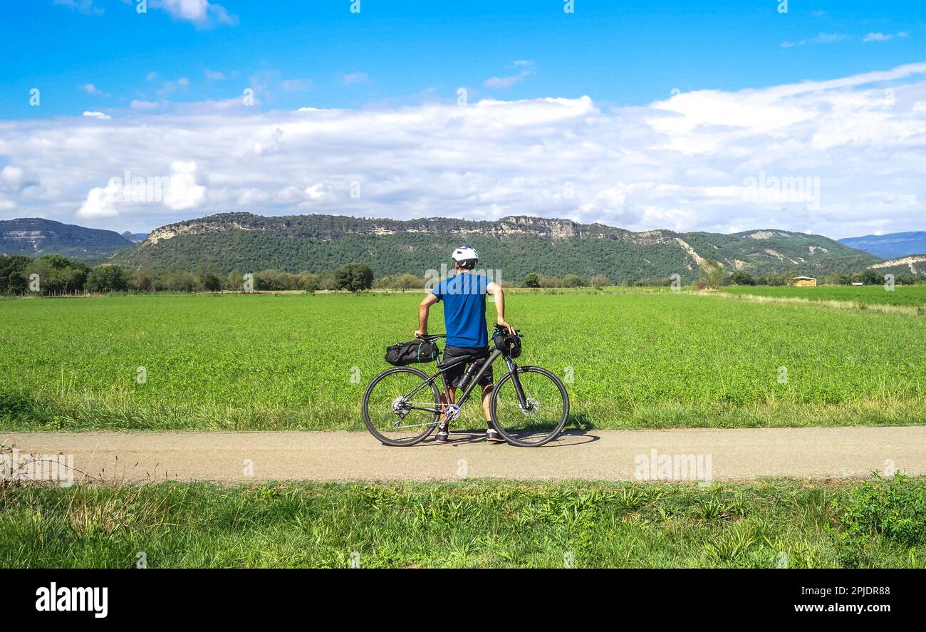 Adventurous man in nature with a bikepacking bike. cycle tourism Stock ...