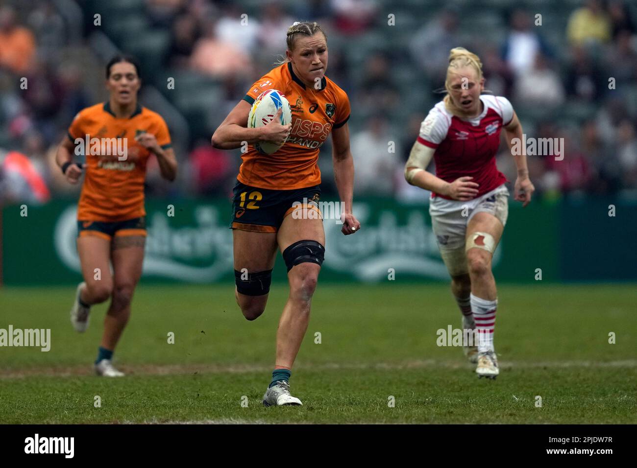 Australia's Maddison Levi runs with the ball as he breaks away from ...