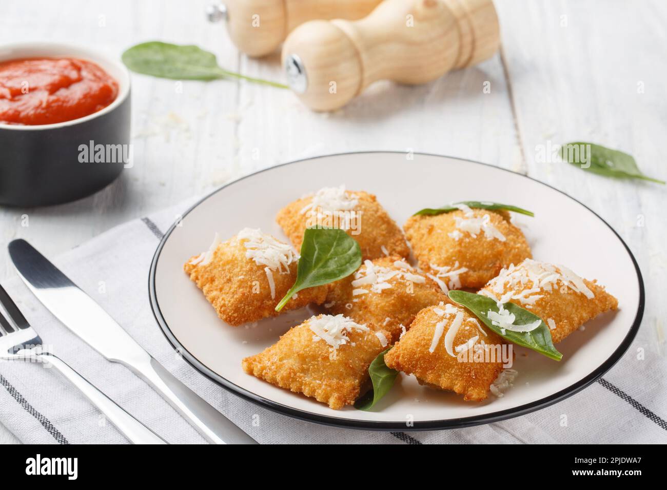 Deep fried traditional italian dish ravioli dumplings stuffed with ...