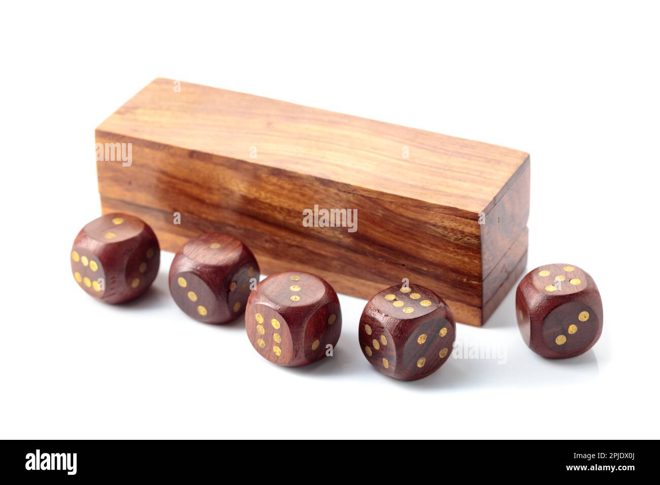 The old wooden dice with the box is isolated on a white background ...