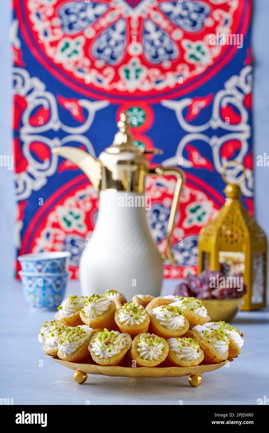 Arabian pancake Qatayef with qishta cream and coffee dallah ...