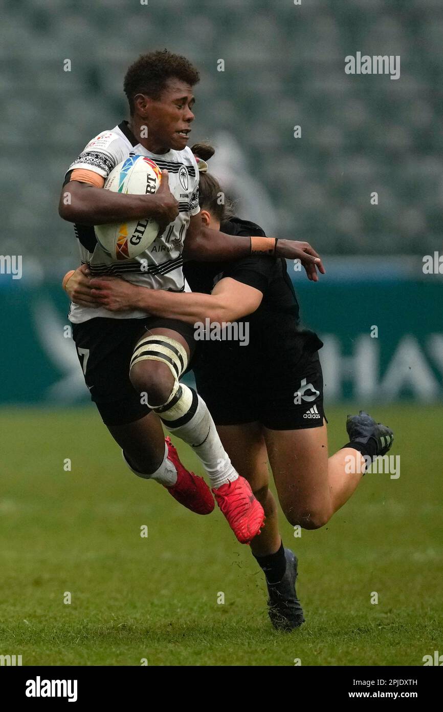 Fiji's Lavena Cavuru is tackled by New Zealand's Michaela Blyde during ...