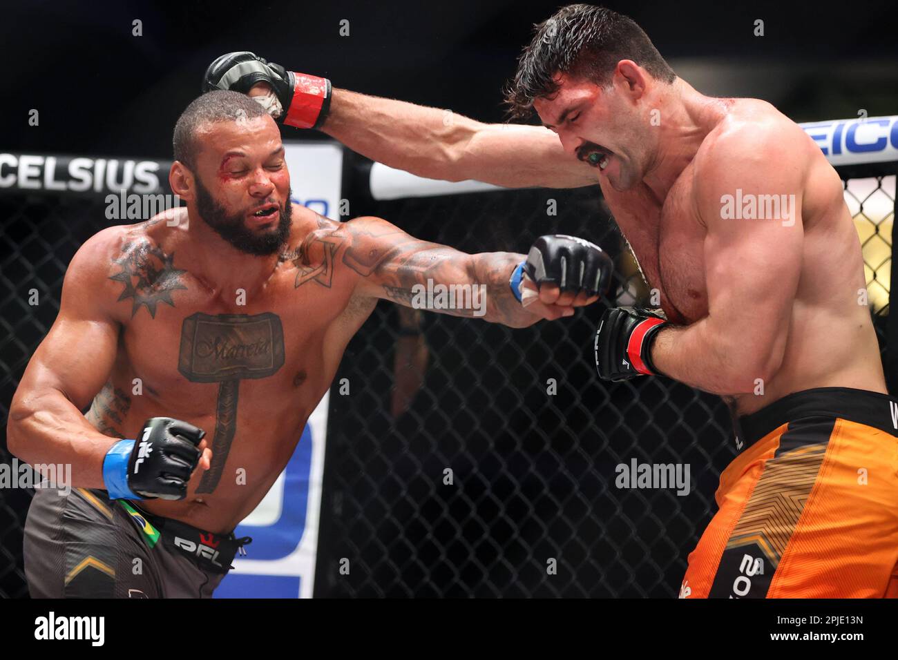 Las Vegas, NV, USA. 1st Apr, 2023. Light Heavyweight (L) Thiago Santos ...