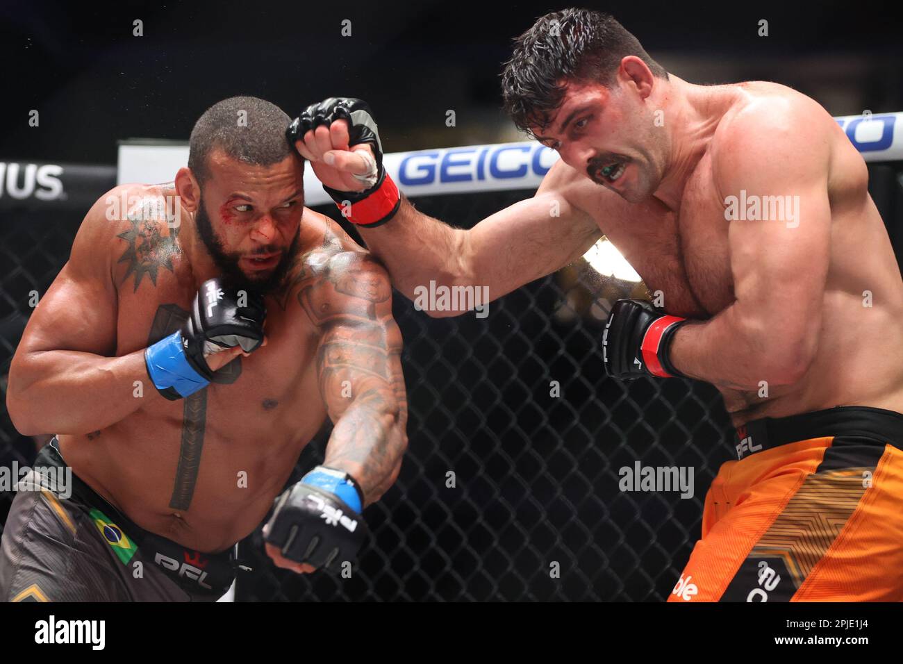 April 1, 2023: Light Heavyweight (L) Thiago Santos and (R) Robert Wilkinson exchange punches ...