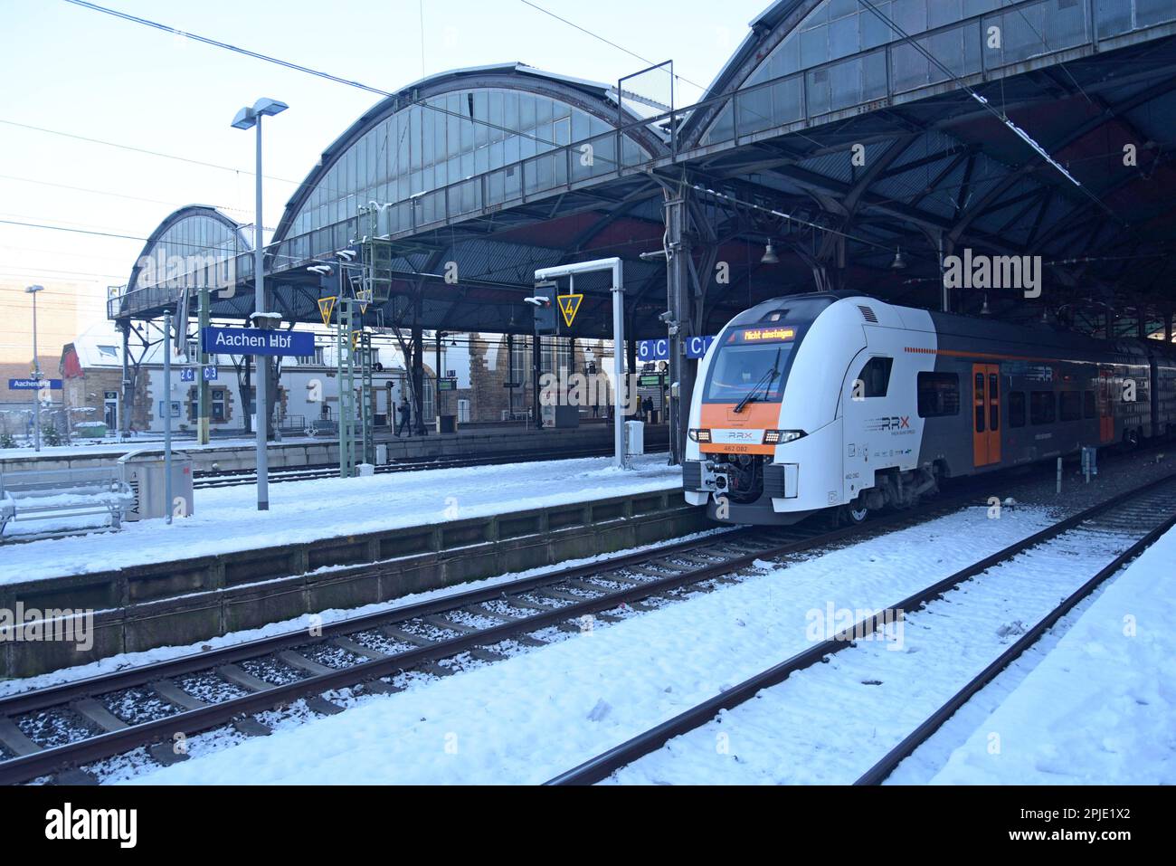 Regional Deutsche Bahn trains at Aachen Railway Station in the snow ...