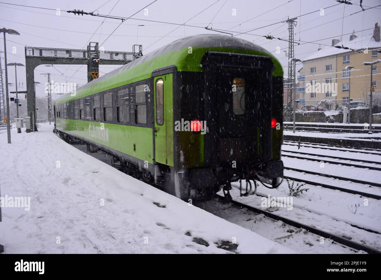 A Flixtrain budget intercity train departs Aachen station Germany in ...