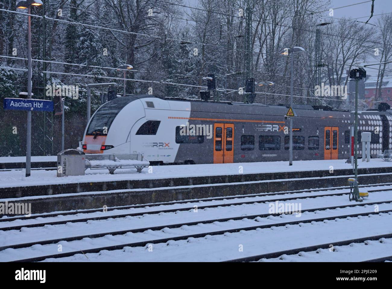 Regional Deutsche Bahn trains at Aachen Railway Station in the snow ...