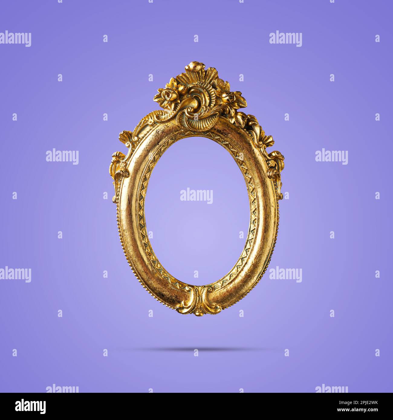 Vintage golden frame against violet background. Minimal composition ...