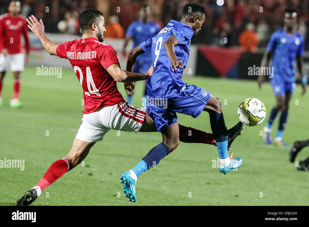Cairo, Egypt. 1st Apr, 2023. Mohamed Abdelmonem (L) of Al Ahly competes ...