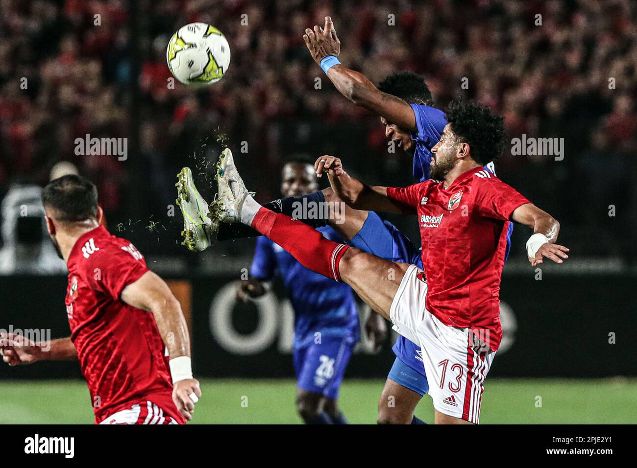 Cairo, Egypt. 1st Apr, 2023. Marwan Attia (front) of Al Ahly competes ...
