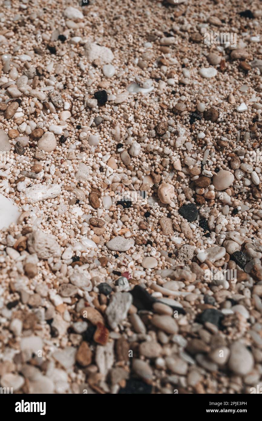 Texture of tiny beige beach pebbles. Natural vertical background Stock ...