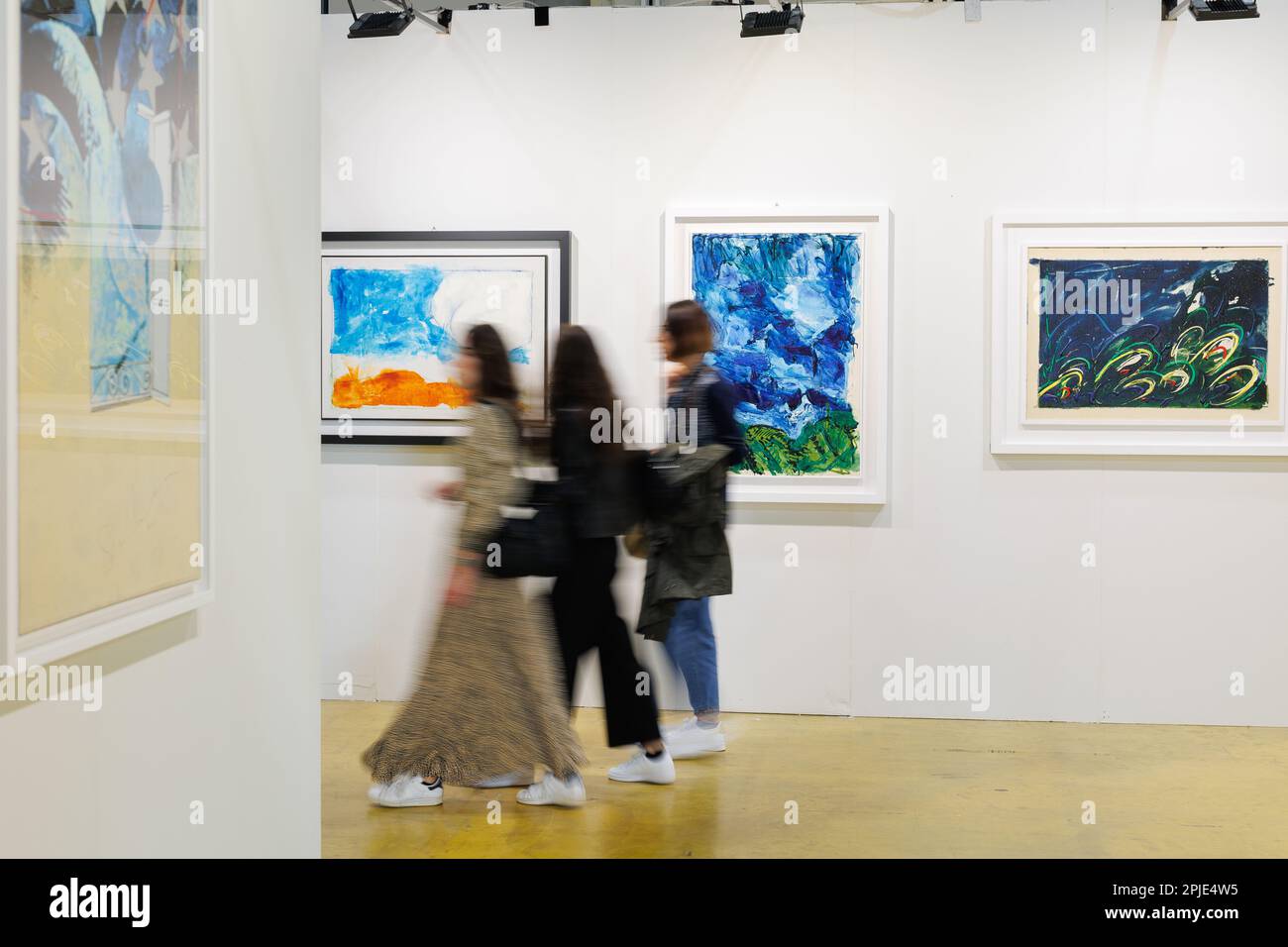 People Walking and Admiring Paintings in a Modern Art Gallery Stock ...