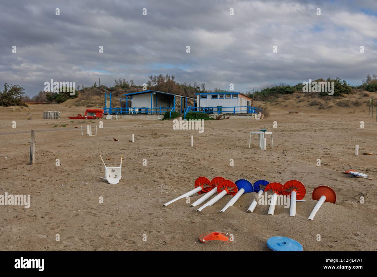 Deserted and Desolate Beach in Winter Time - Umbrella Poles and other ...