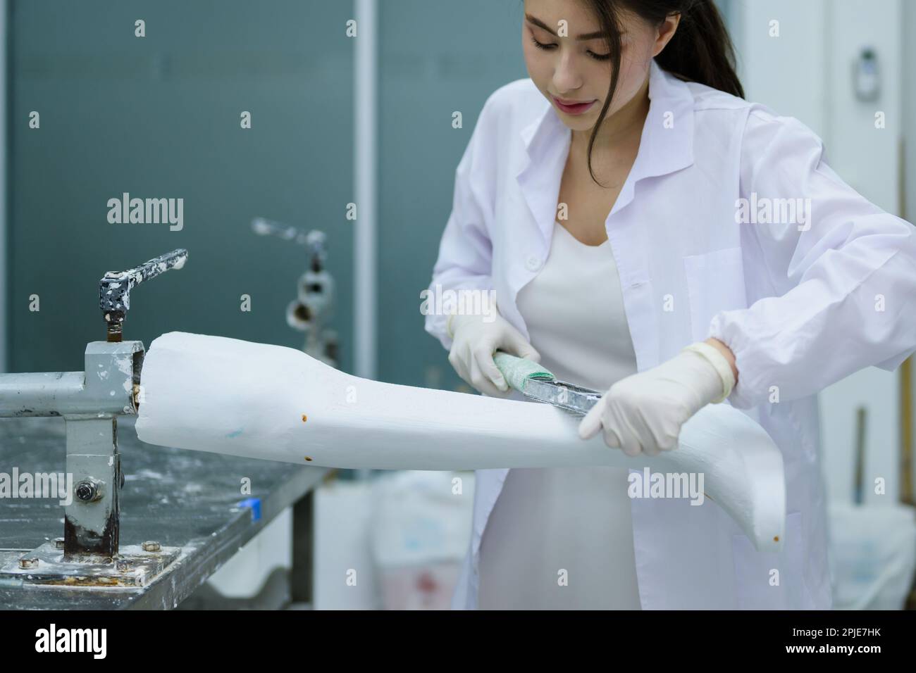Technician sculpting plaster cast for socket at prosthetic factory Stock Photo - Alamy
