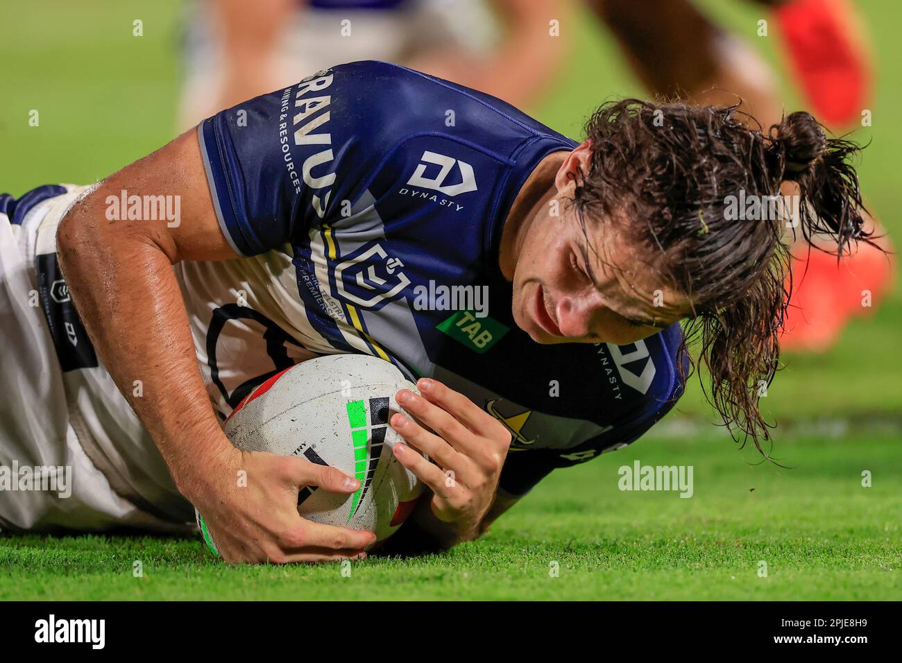 Tom Chester of the Cowboys scores a try during the NRL Round 5 match ...