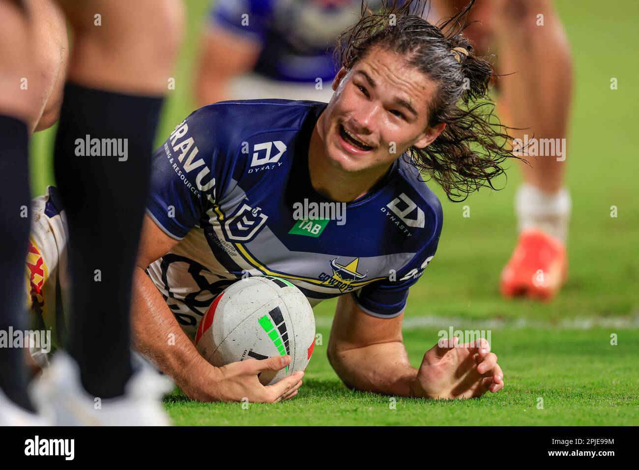 Tom Chester of the Cowboys scores a try during the NRL Round 5 match ...