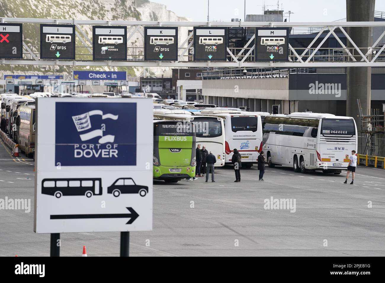 Coaches wait to enter the Port of Dover in Kent after extra sailings ...
