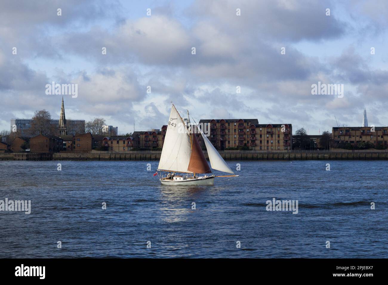 Traditional Gaff rigged cutter sailing on the Thames at Greenwich Stock ...