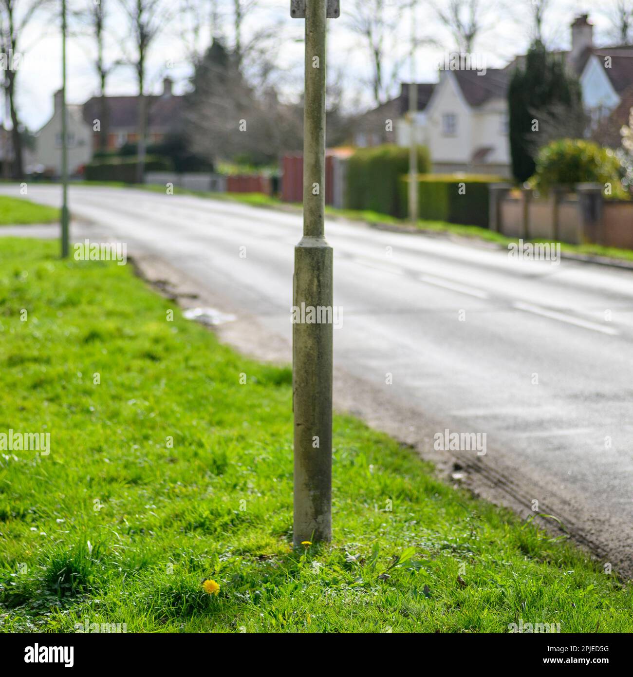 Lamppost on a grass verge Stock Photo - Alamy