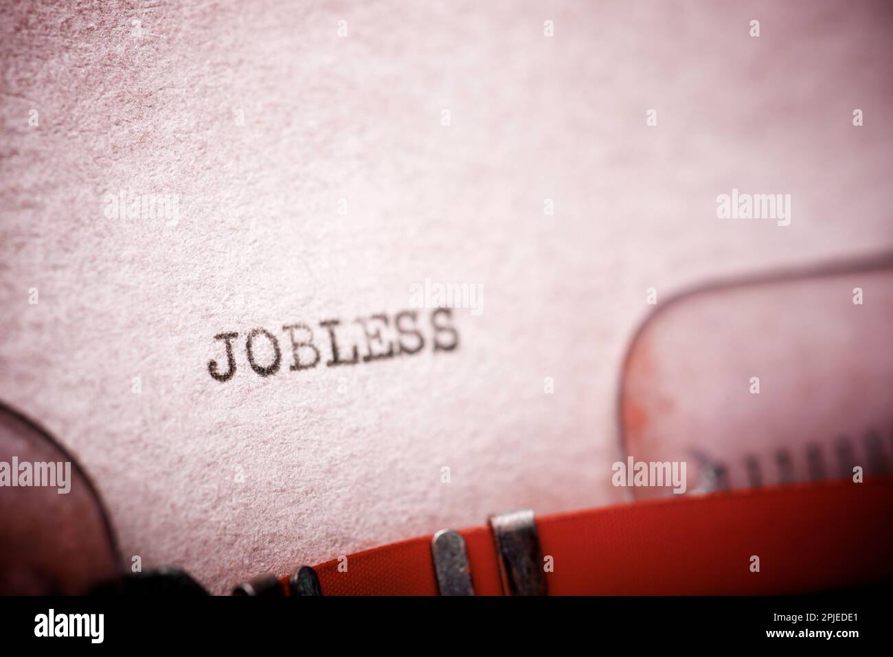 Jobless word written with a typewriter Stock Photo - Alamy