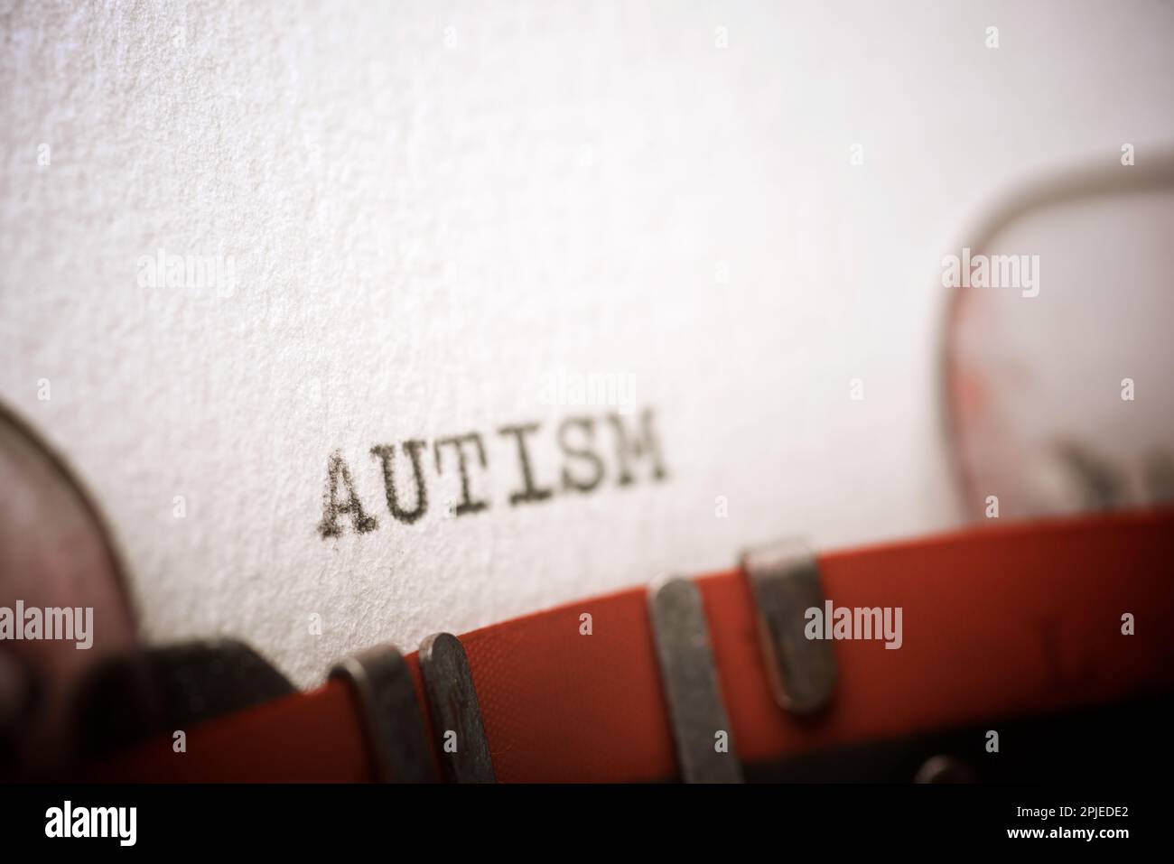 Autism word written with a typewriter Stock Photo - Alamy