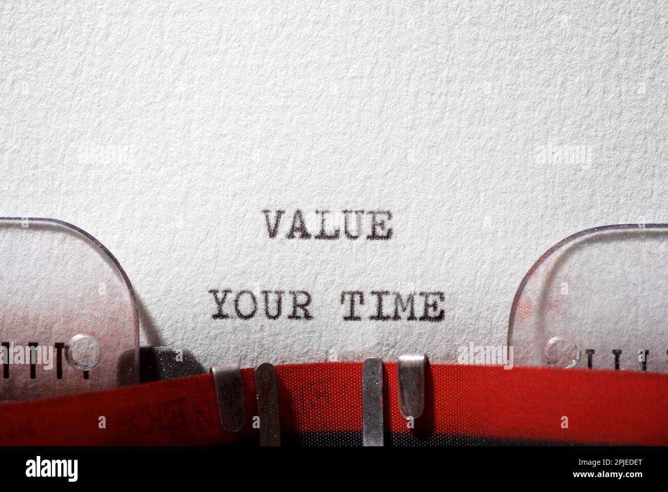 Value your time text written with a typewriter Stock Photo - Alamy