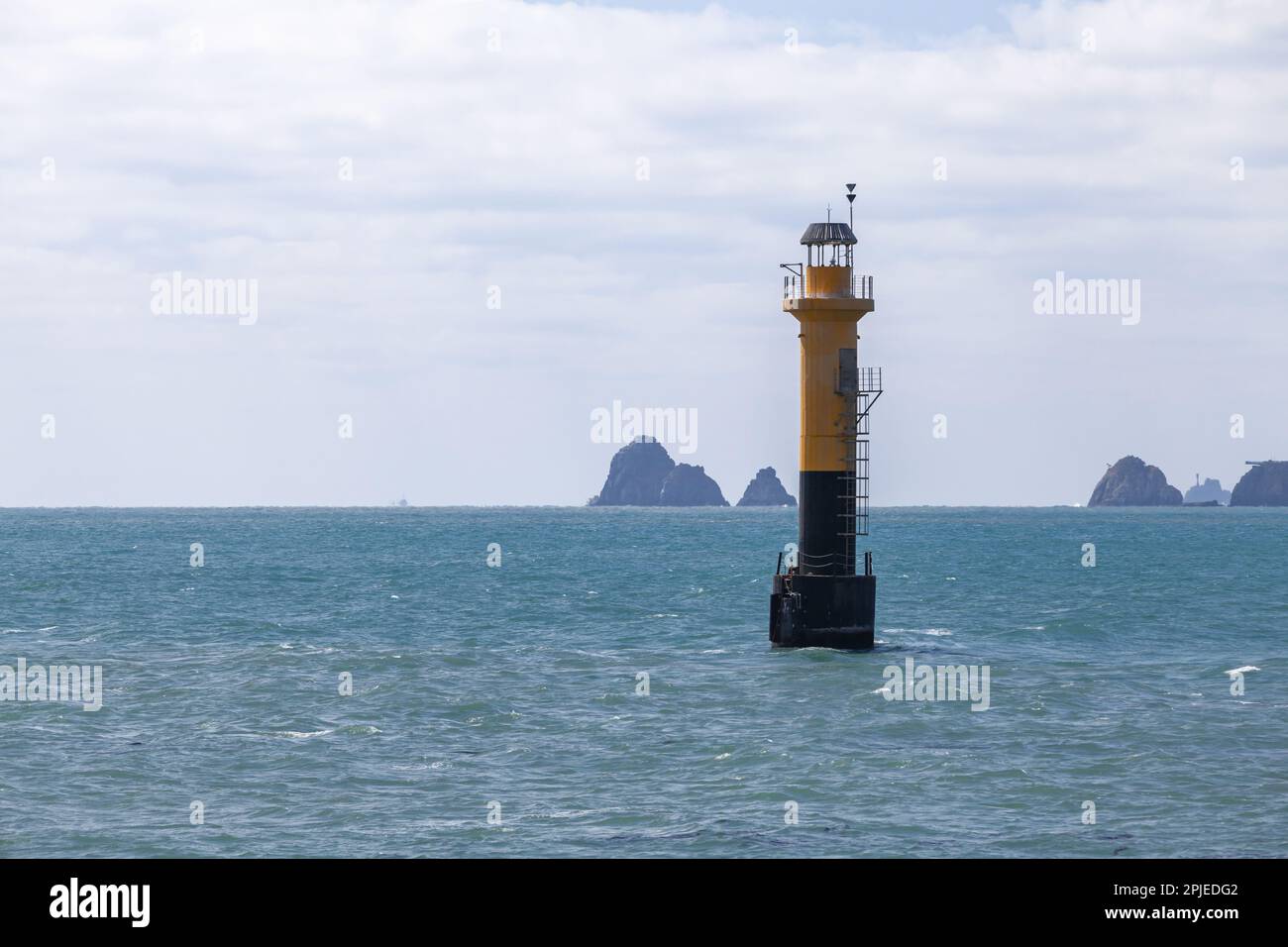 South cardinal navigation mark. Yellow black beacon tower Stock Photo ...