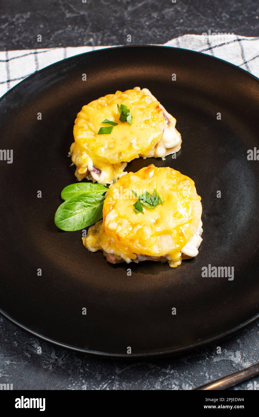 Meat in French - baked meat with ananas, onion, cheese and mayonnaise ...