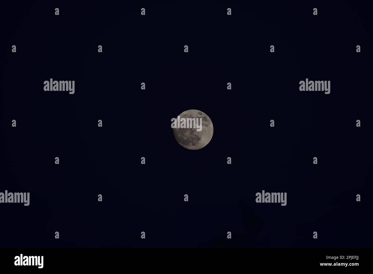 Full moon in dark sky Stock Photo - Alamy