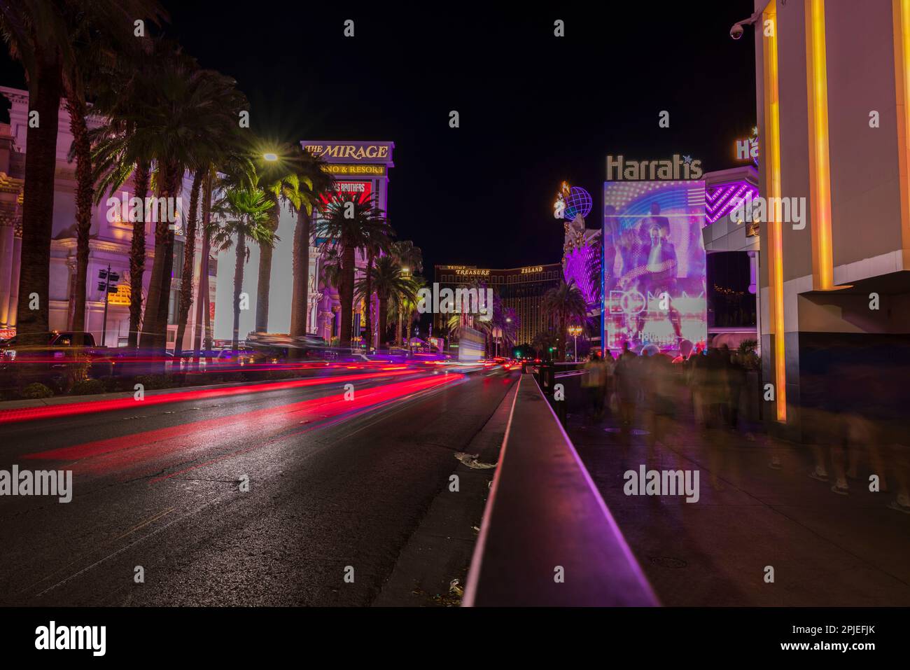 Beautiful view of out-of-focus strip road tracers. Night view of Las Vegas cityscape with ...