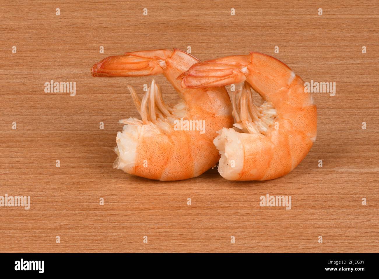 Perfectly retouched shrimp on wood background. High resolution photo ...