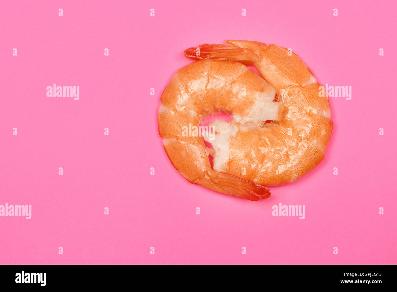 Perfectly retouched shrimp isolated on pink. High resolution photo ...